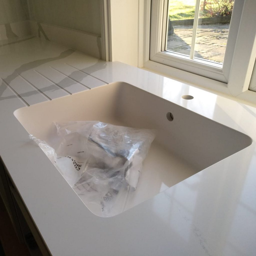 Discover Stylish Quartz Sinks with Drainers for Your Kitchen