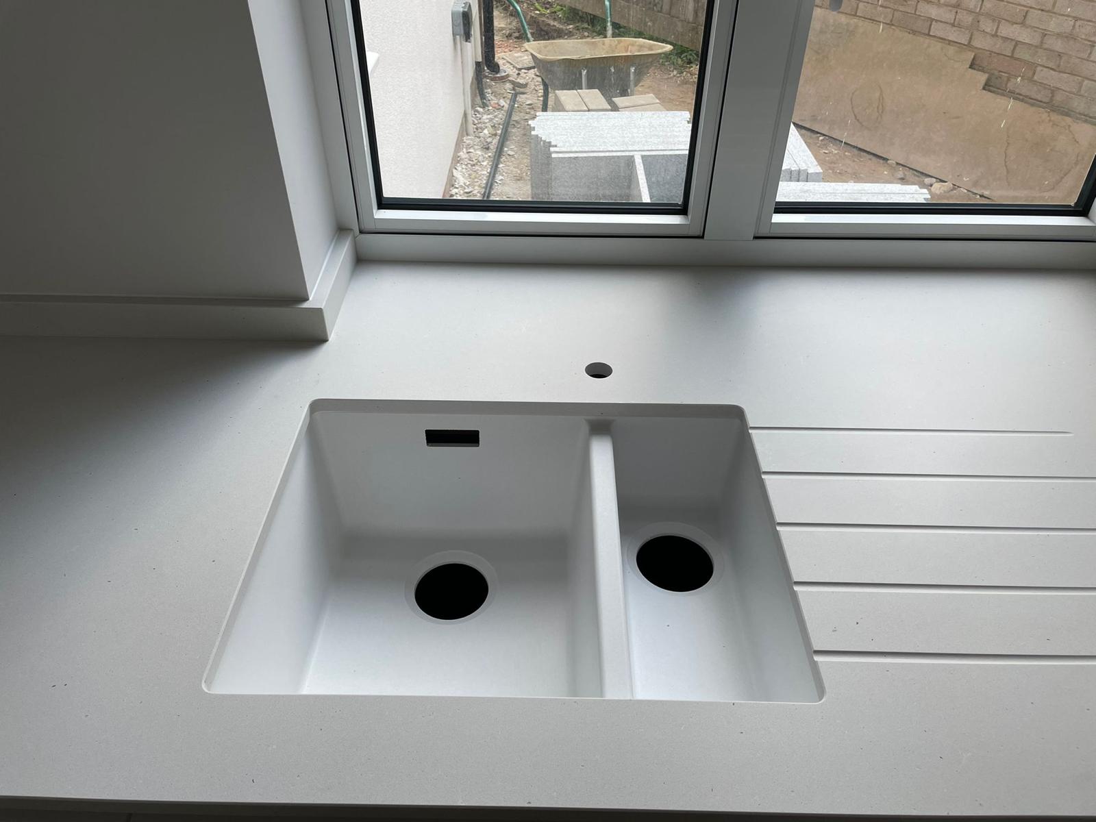 Discover Stylish Quartz Sinks with Drainers for Your Kitchen